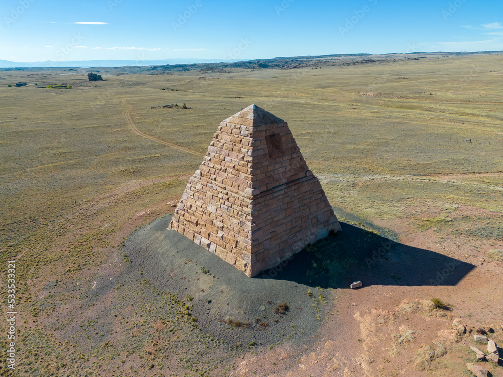 Large pyramid of stone and rock in United States plains desert with ...