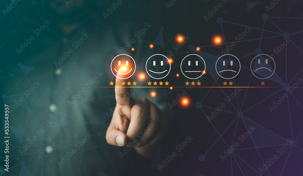 The customer pressing smiley face emoticon on the virtual touch screen ...