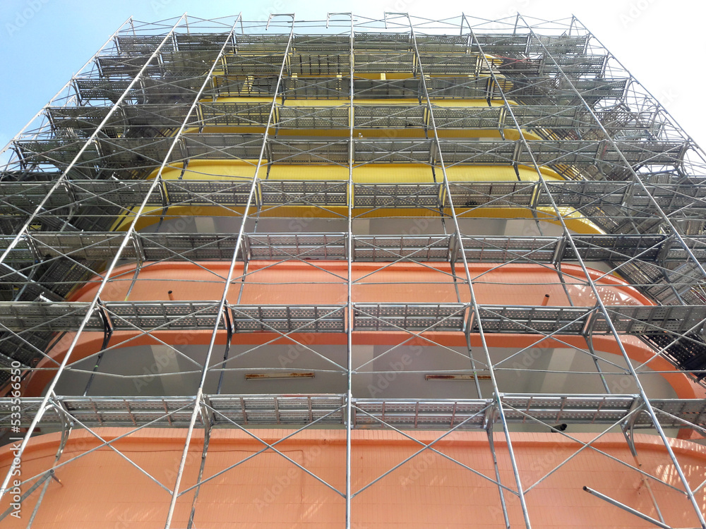 Scaffolding house. School. Building. High-rise, renovation. Scaffolding ...
