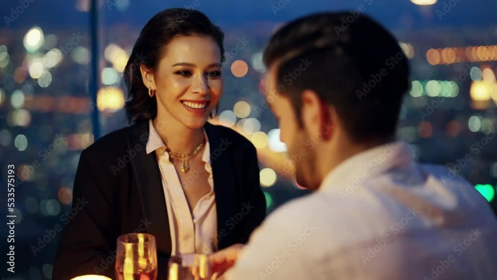 4K Caucasian couple celebrating holiday event at luxury skyscraper ...