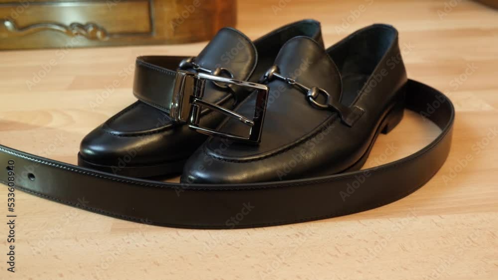 Stylish black men's shoes with a belt. Stock Video | Adobe Stock