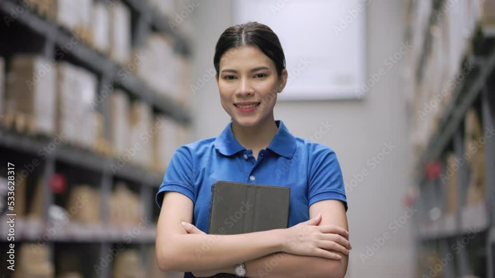 Confident woman employee holding tablet working inspection at store ...