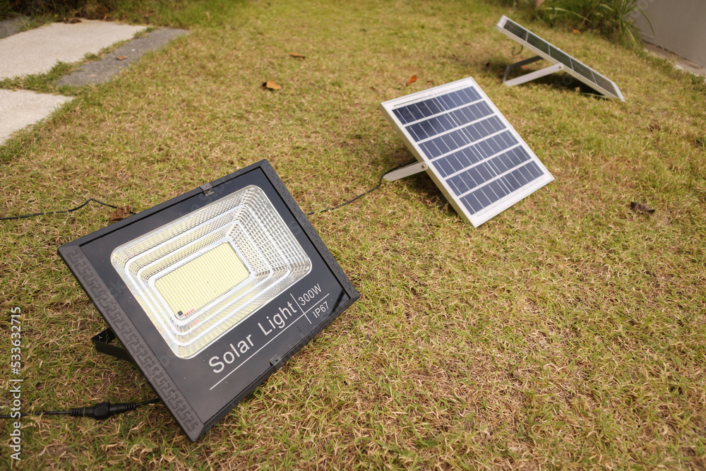 solar panel with spotlight in the house garden Stock Photo | Adobe Stock