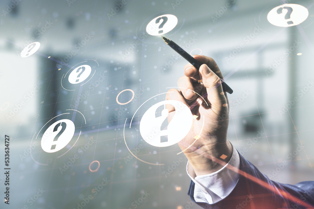 Man hand with pen working with abstract virtual question mark hologram ...