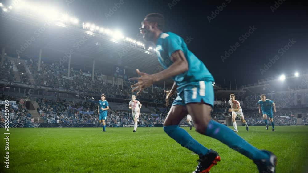 Football Championship: Blue Team Forward Hits the Ball and Scores ...