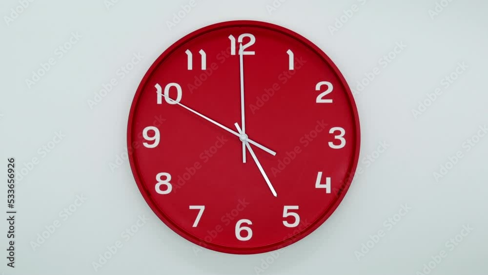 The Time On The Clock Five. Red Clock With White Background And The ...