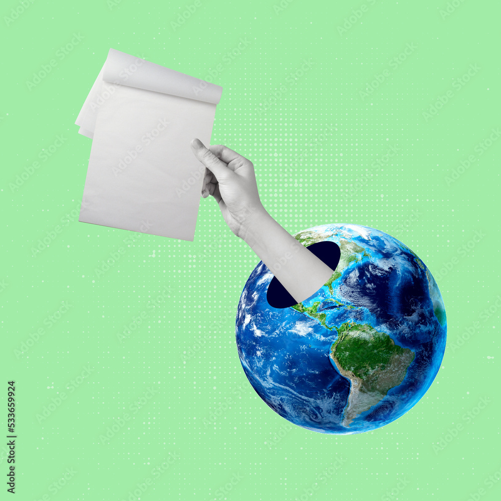 A hand appears from the earth and holds a notepad. Advertising concept ...