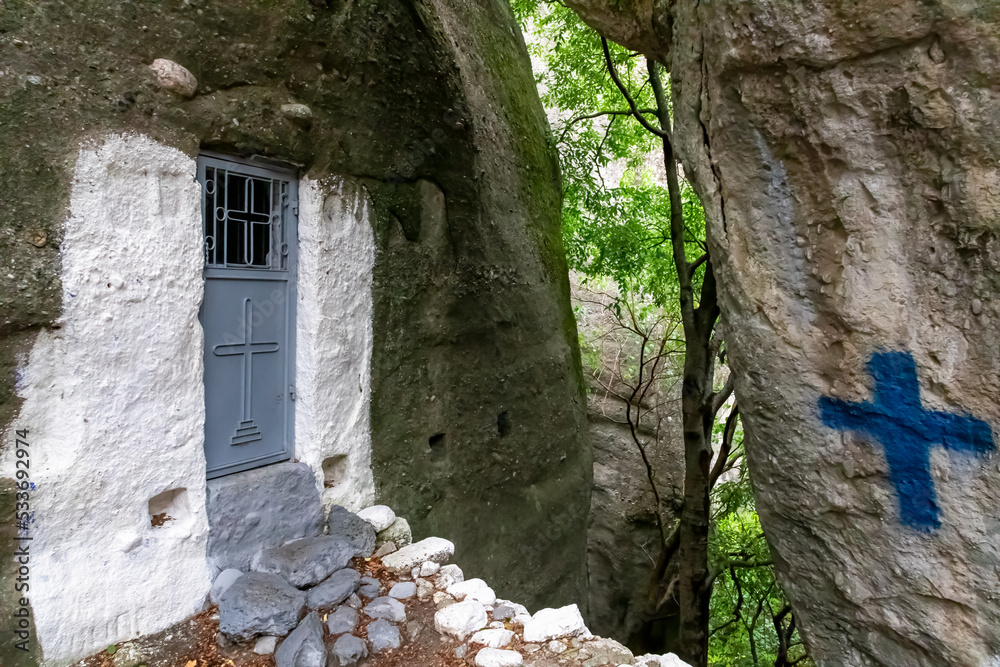 The small chapel carved into the rock on the footpath to the rock Holy ...