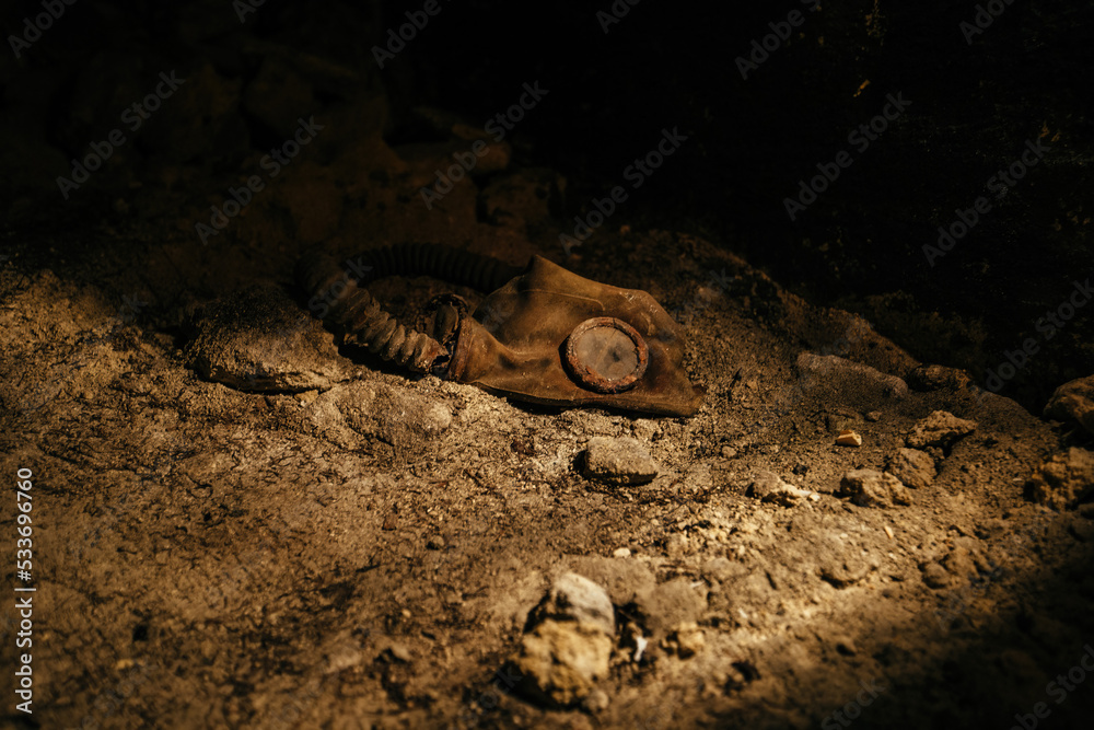 Old rotten Soviet gas mask on ground. Post-apocalyptic concept Stock ...