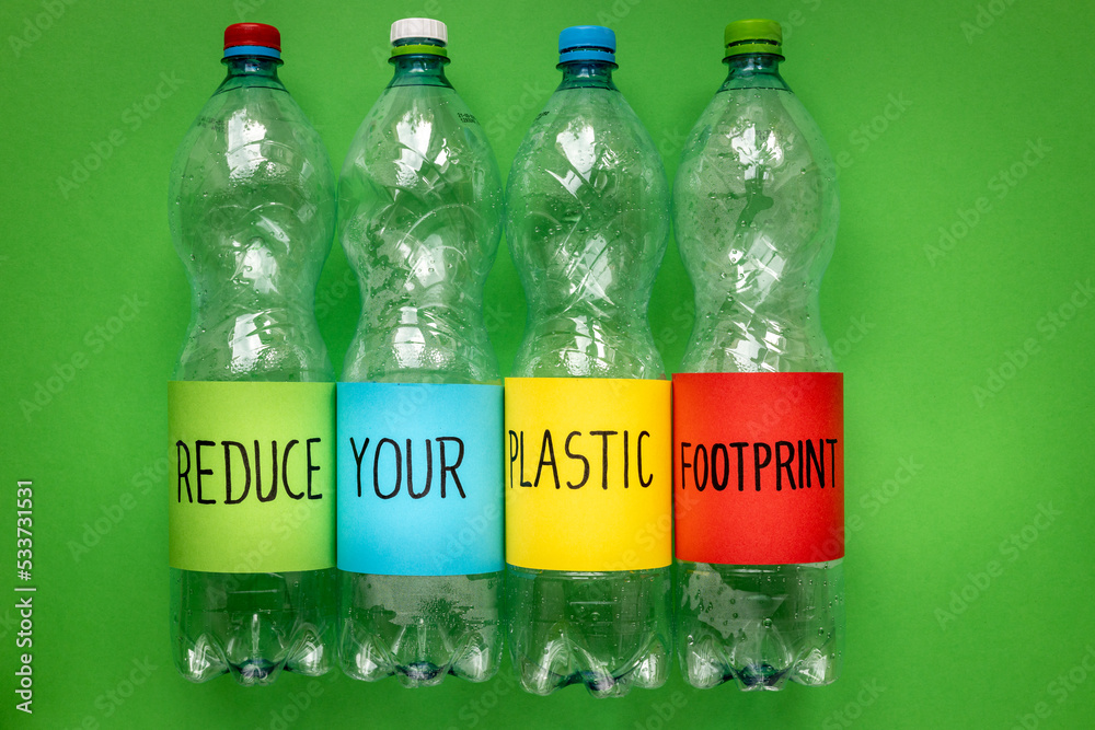 Reduce Your plastic footprint, Handwritten plastic bottles ...