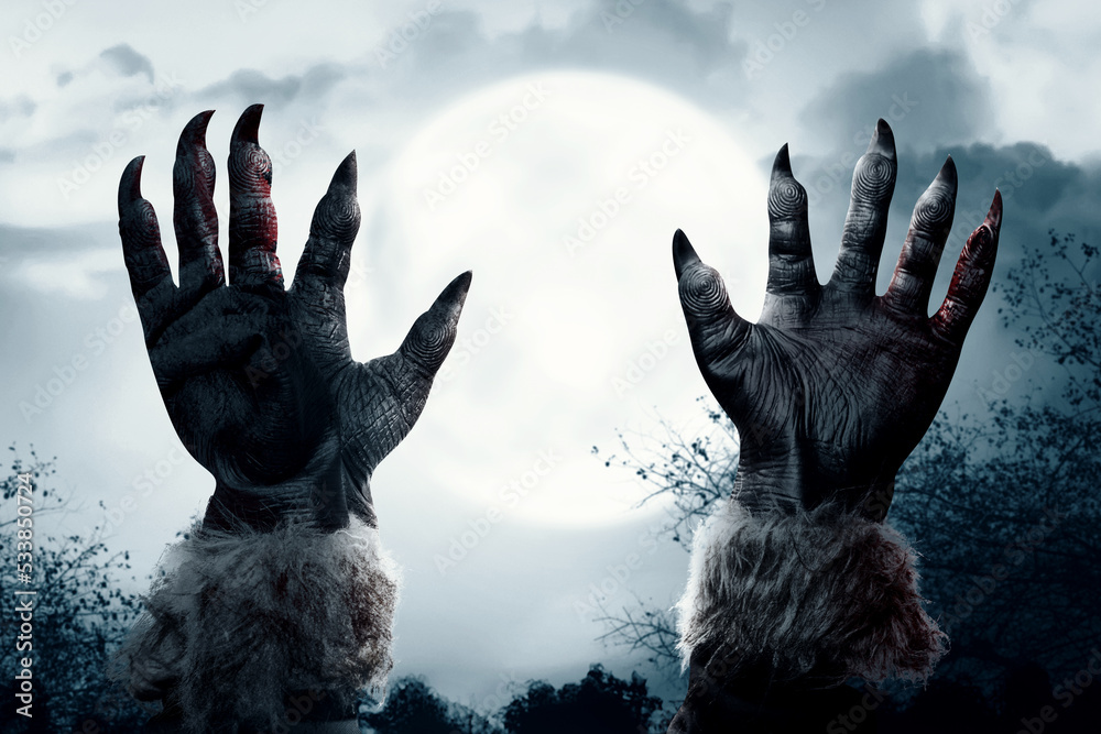 Werewolf hand with a full moon Stock Photo | Adobe Stock