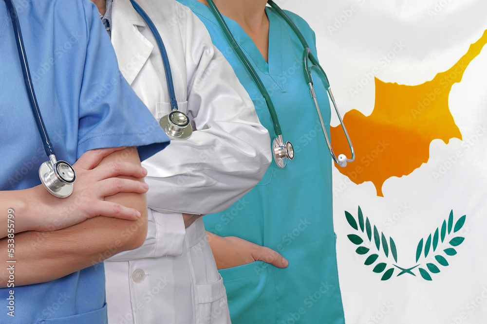 Three Doctors with stethoscope in standing on Cyprus flag background ...