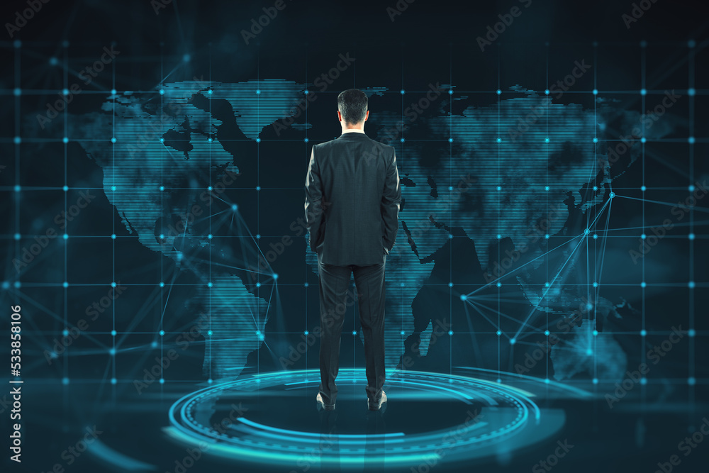 Back view of businessman standing in abstract interior with map ...