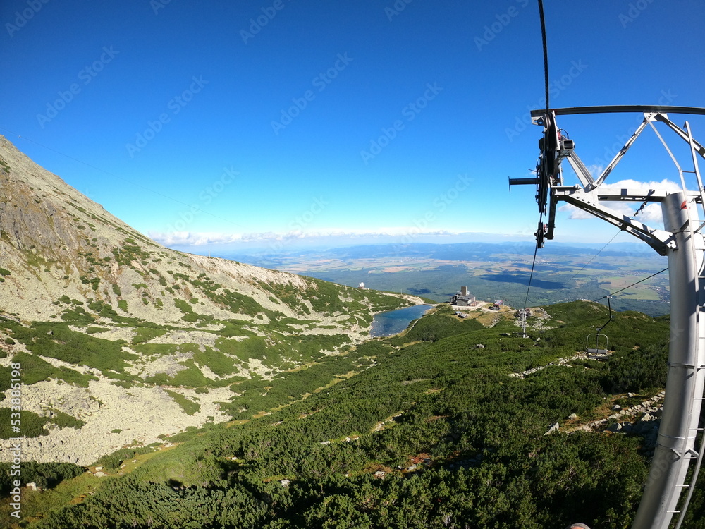 Cable car trail from Lomnicke Sedlo in High Tatras, Slovakia. Skalnate ...