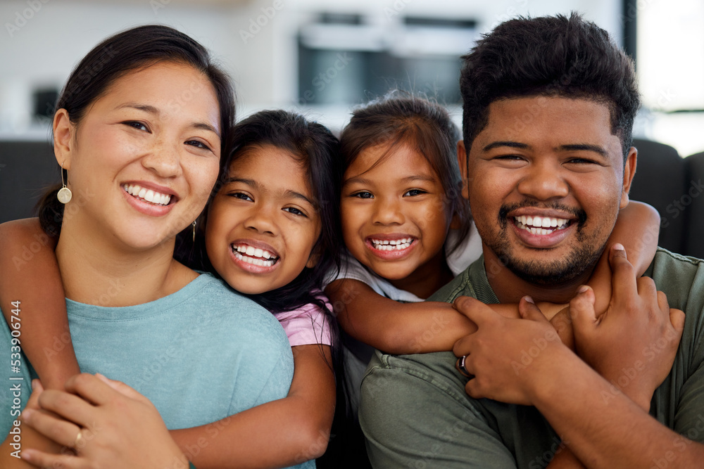 Family, smile and love of children for their mom and dad while sitting together in the lounge at ...