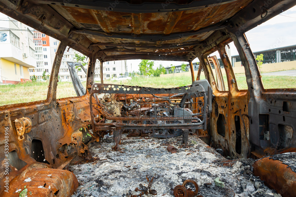 Damaged and destroyed civilian car with shrapnel holes from Russian ...