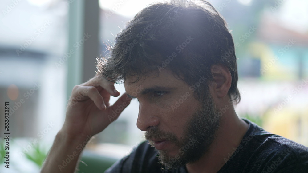 Thoughtful man thinking solution. One pensive person pondering solving ...