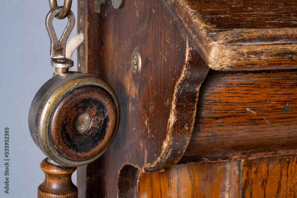 Brown wooden case of an old telephone set with receiver. Old shabby ...