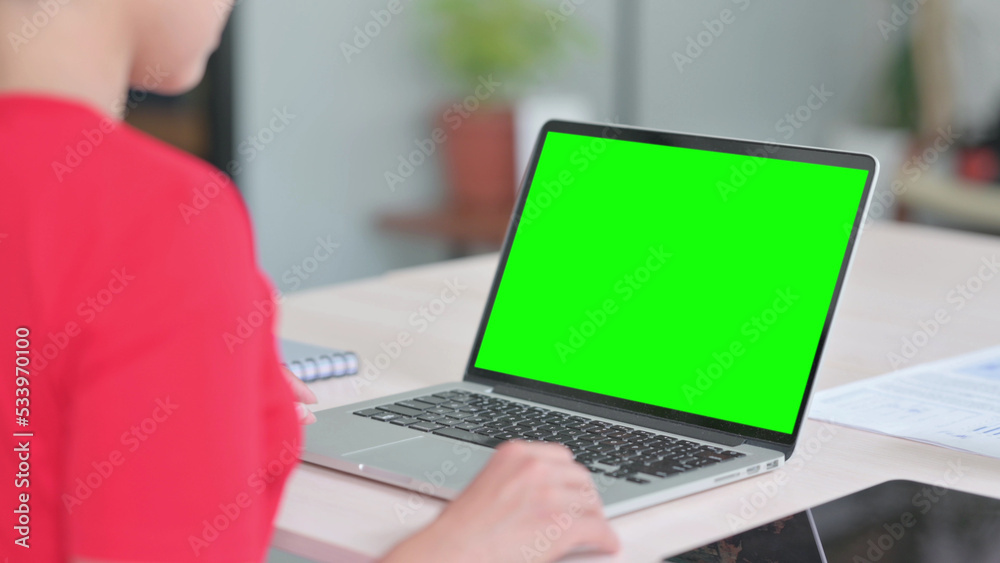 Indian Woman Using Laptop with Green Screen Stock Photo | Adobe Stock