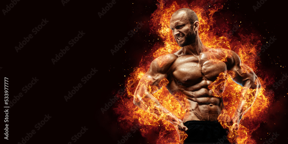 Bodybuilder posing on the fire flames background Stock Photo | Adobe Stock