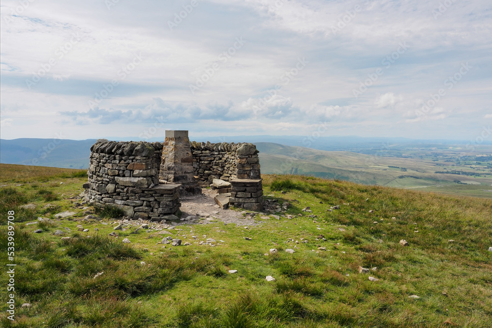 Wild Boar Fell summit and triangulation point enclosed by a circle of ...