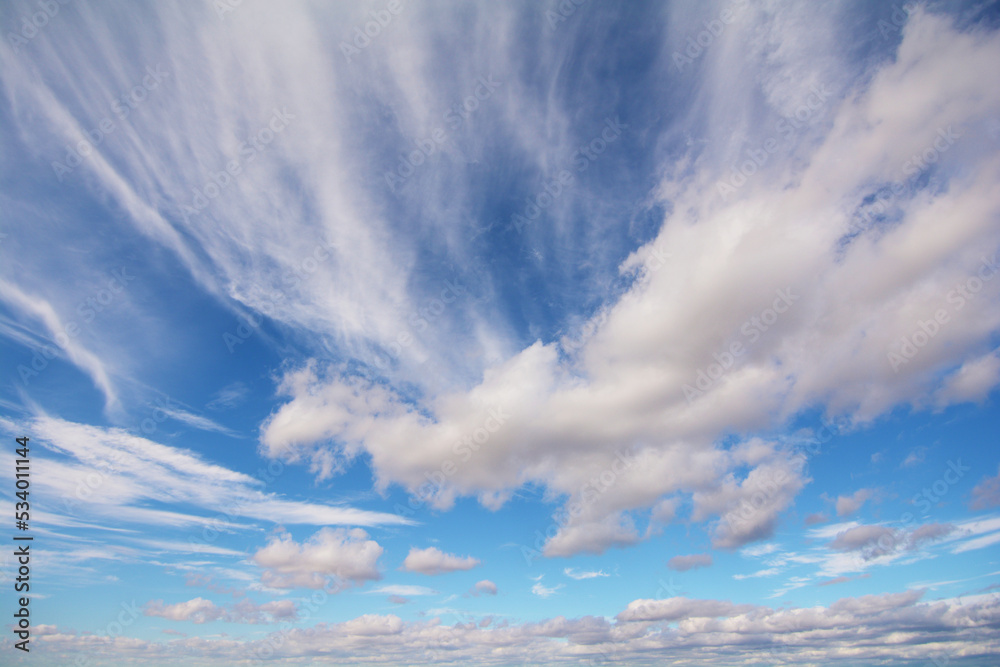 Blue sky that looks vast and long with great perspective and puffy ...