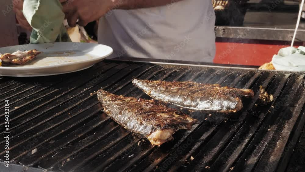Grilled fish diner kebab in Istanbul. Balyk sandwich street food in ...