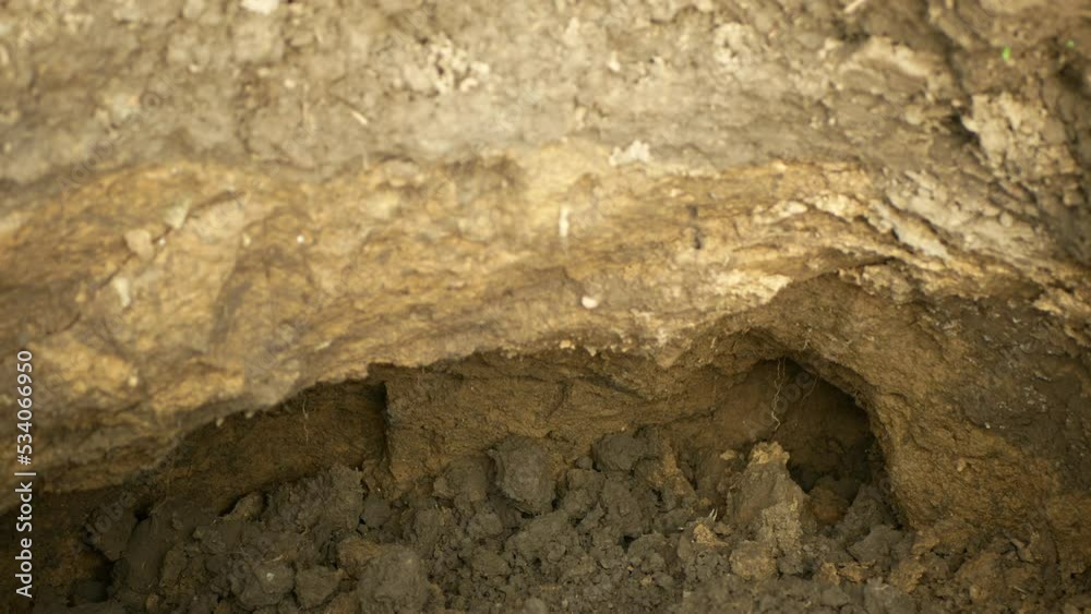 Erosion hole damage pit field subsoil tractor track hole pit soil ...