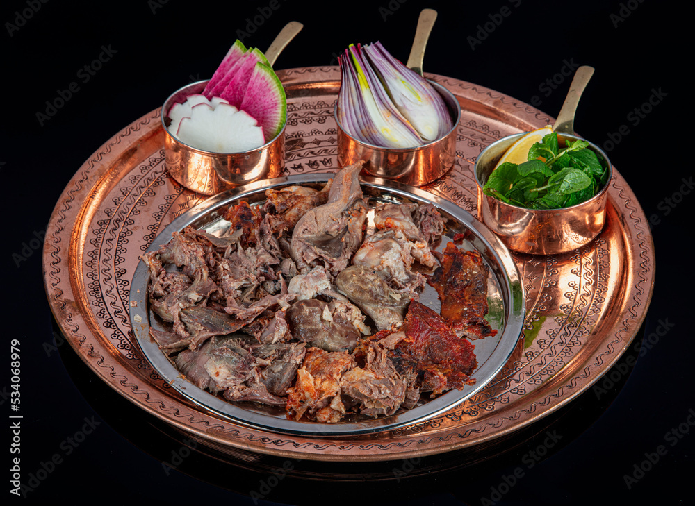 Turkey national cuisine dish Roasting lamb with meat. Roasted head of ...