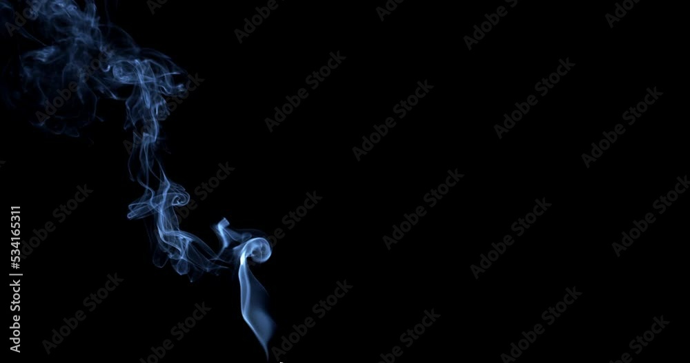 Real smoke on a black background. Thin Flexible Trickle of Real Smoke ...