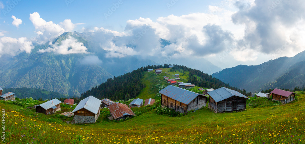 Traditional wooden houses at highlands. Landscape photo was taken in ...