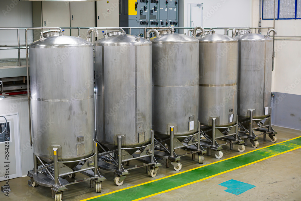 Stainless vertical steel tanks with pressure meter in equipment tank ...