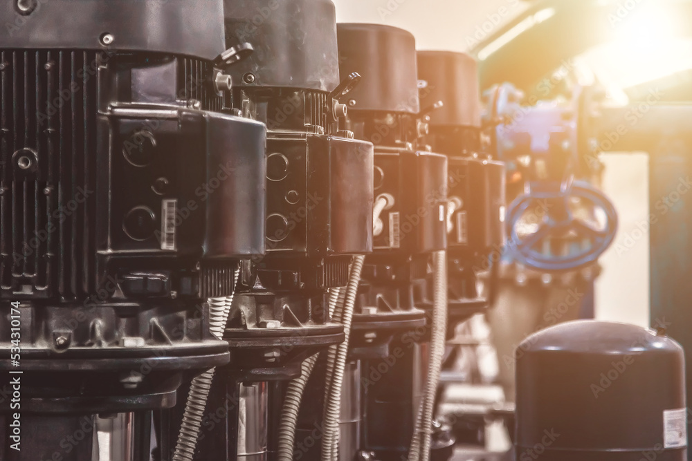 Industry interior of water pump, valves, pressure gauges, motors inside ...