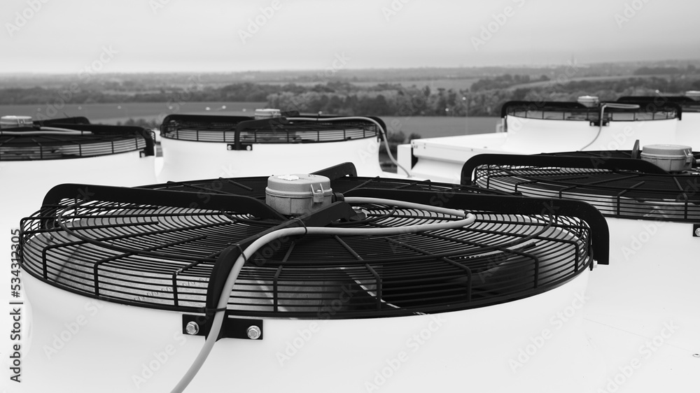 Industrial condenser fans on roof used in air conditioning, ammonia or ...