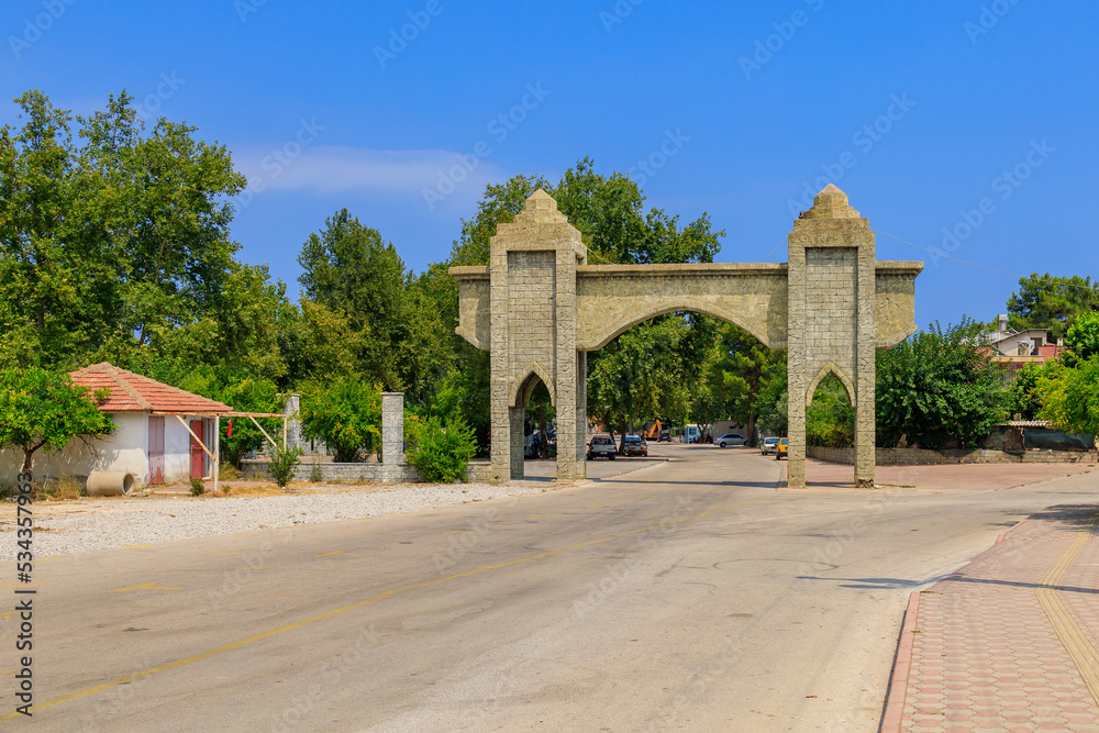 Turkish city gate in classical Islamic architecture style. August 7 ...