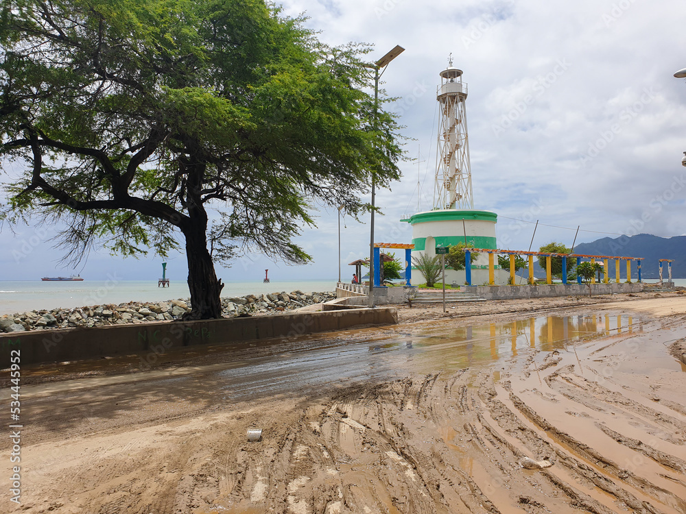 Puddles, water and thick mud covering main road in city centre after ...