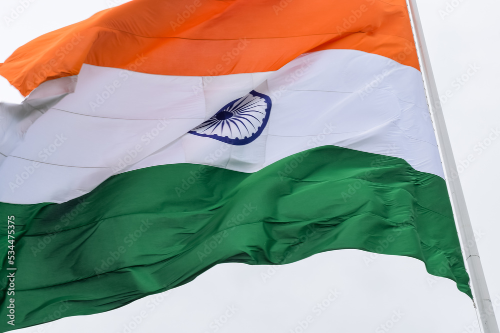 India flag flying high at Connaught Place with pride in blue sky, India ...