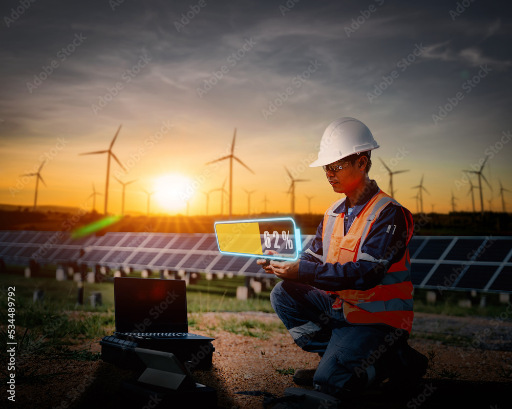 The solar farm(solar panel) with engineers check the operation of the ...