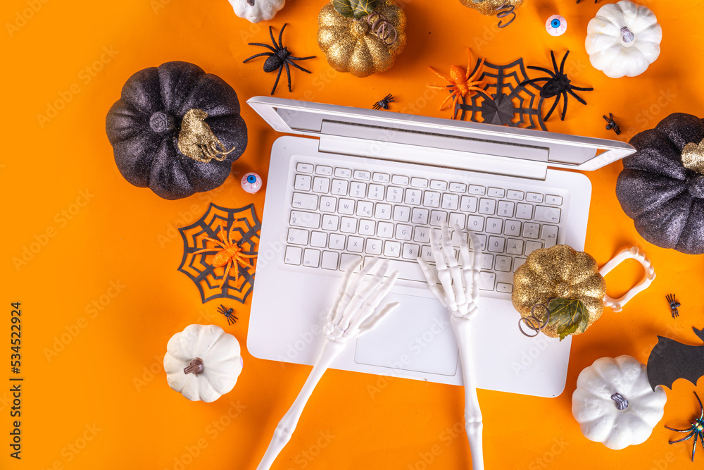 Funny Halloween workplace with laptop flat lay. Office corporation ...