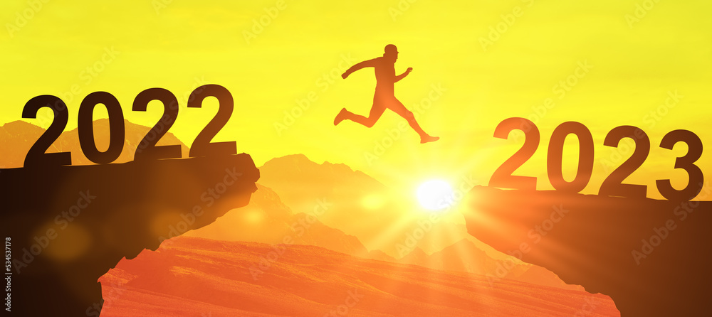 2023. Silhouette man jumping between cliff with number 2022 to 2023 ... 2023. Silhouette man jumping between cliff with number 2022 to 2023 ...