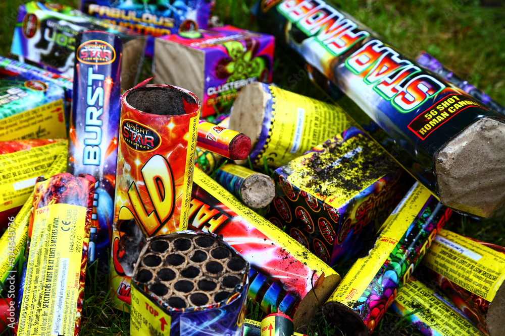 Heap of used burnt firework shells left over from a bonfire night ...