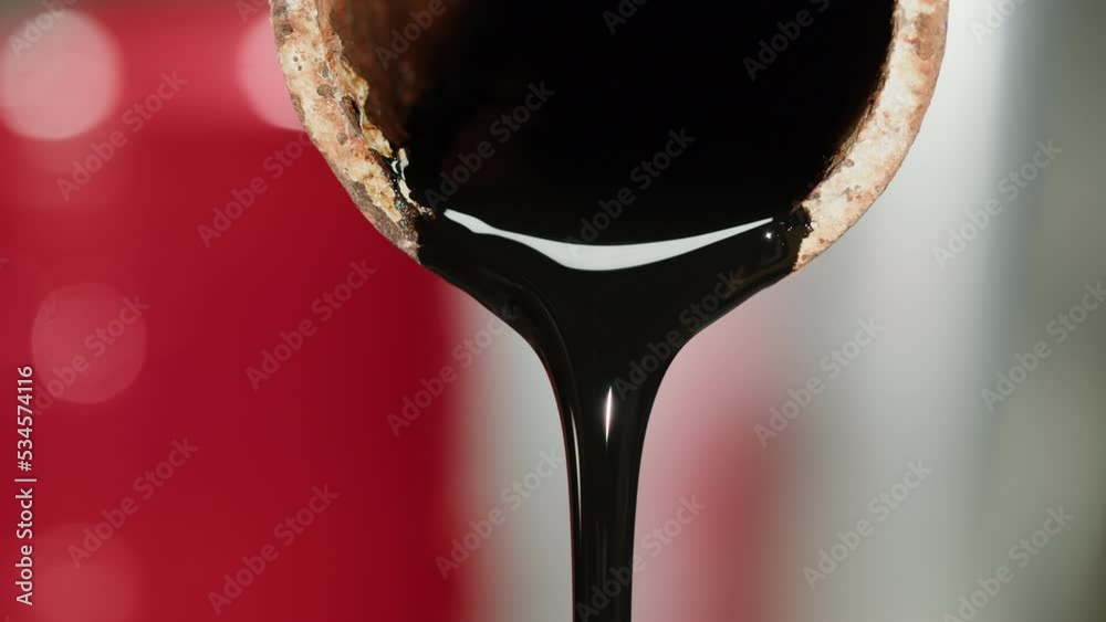 Crude black Brent oil pipeline pouring close up background with man ...