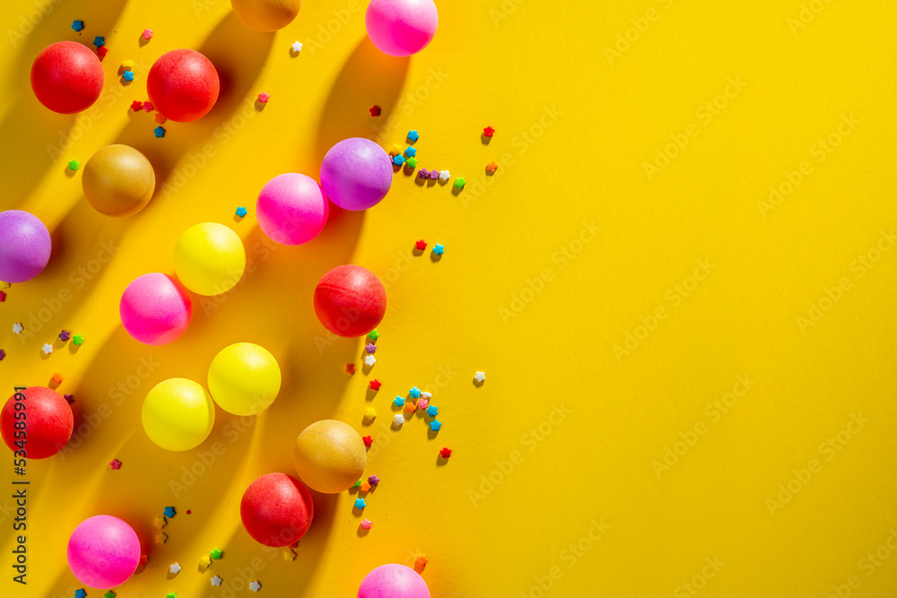 Abstract colored balls background. Multi-colored taw toy scattered on ...