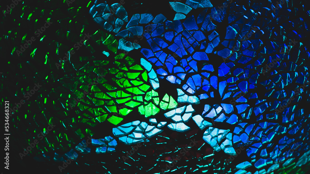 Shattered glass pattern in the dark. abstract cracked background. green ...