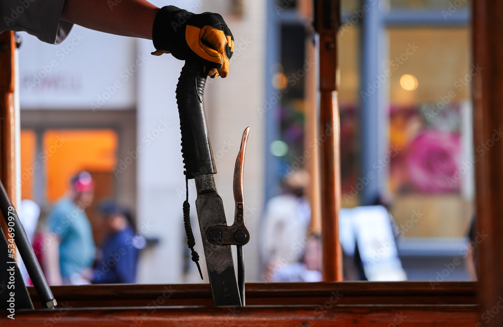 San Francisco cable car system. Detail view of a motorman hand on the ...