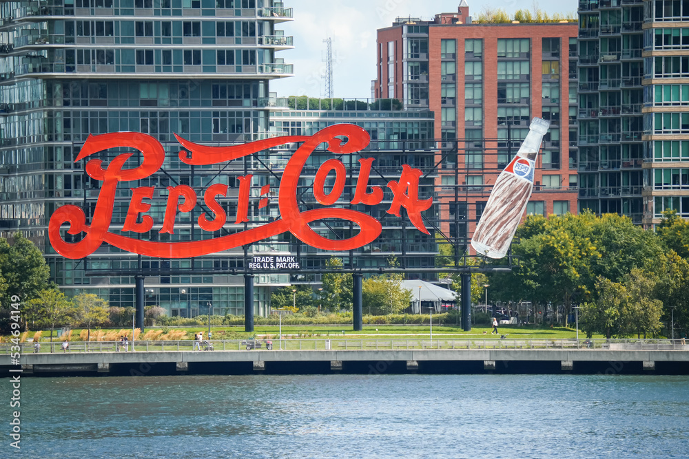 The logo sign of PepsiCola company photographed from Manhattan to Eas ...