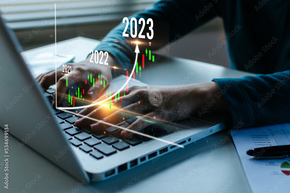 2023. people hand using laptop computer working business financial with ...
