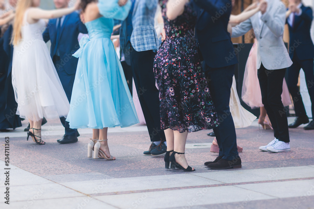 Foto de High school graduates dancing waltz and classical ball dance in ...
