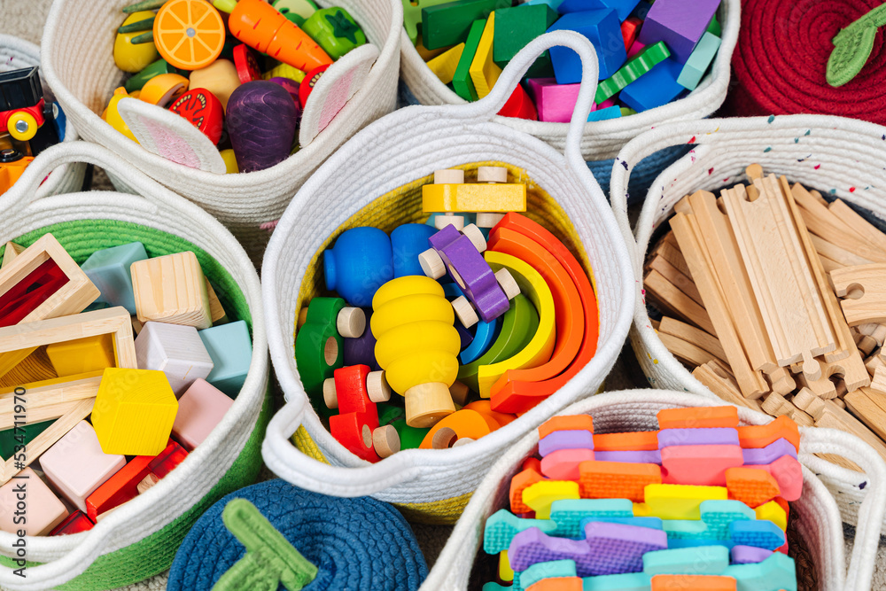 Colorful Toy Storage Baskets in the children's room. Cloth stylish ...