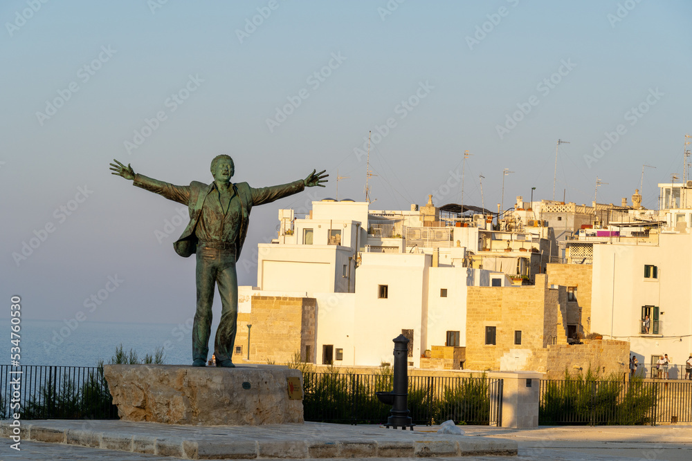 Bari, Puglia, Italy. Jul 2022: Statue of Domenico Modugno at Polignano ...